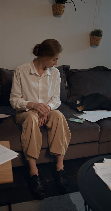 A Woman Using A Meditation App On A Couch · Free Stock Video