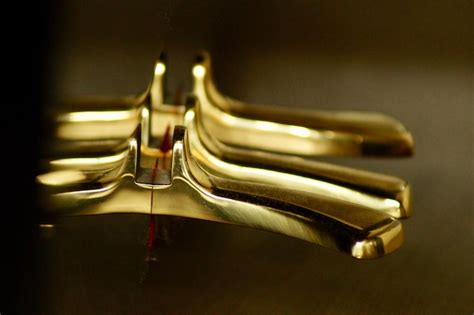 Premium Photo Close Up Of Golden Objects