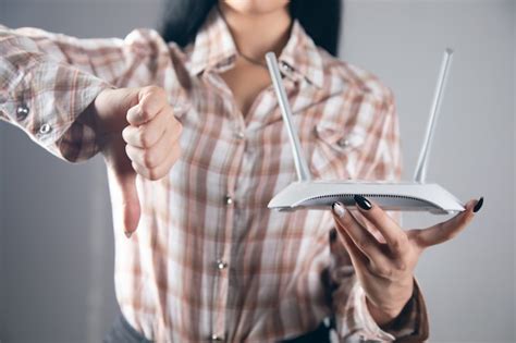 Premium Photo Wifi Router On Female Hand With Bad Sig