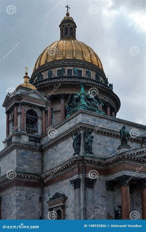 historic building in style of classicism facade exterior with green
