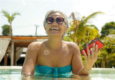 Attractive And Happy Asian Indonesian Middle Aged 40s Or 50s Woman In