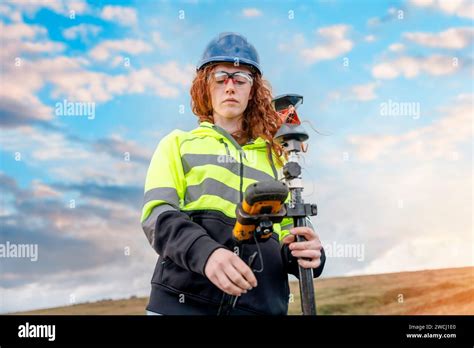 Female Woman Land Surveyor Working With Moder Surveying Geodesic