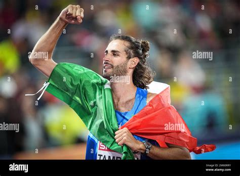 Gianmarco Tamberi With His Countrys Flag After Winning The High Jump