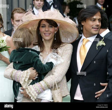 Dpa British Actress And Model Elizabeth Hurley C Holds Her Son