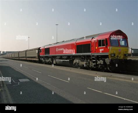 Class 66 Locomotive On A Train Of Cars For Export At Southampton Docks