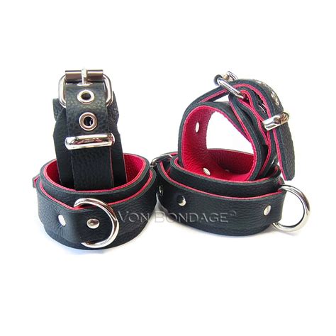 Bdsm Restraints Set With Bondage Straps Lined In Red Leather
