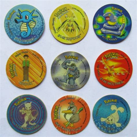 Trading Cards Lot Of 9 Pokemon Tazo 2 Slammers By Simba Was Sold For