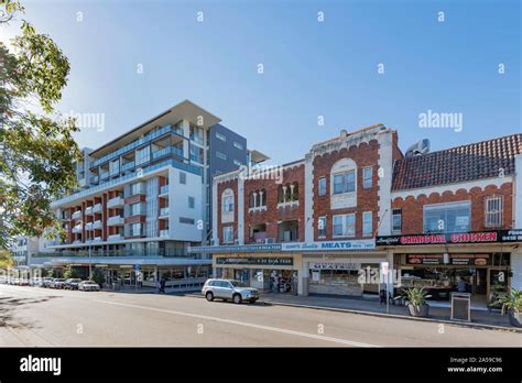 A Modern Multistory Apartment And Retail Block Blends And Combines With