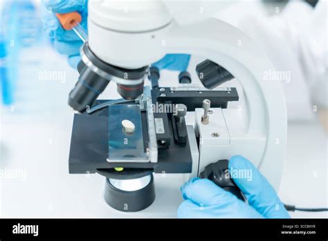 Scientist Analyze Biochemical Samples In Advanced Scientific Laboratory Medical Professional