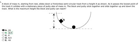 solved a block of mass m starting from rest slides down a