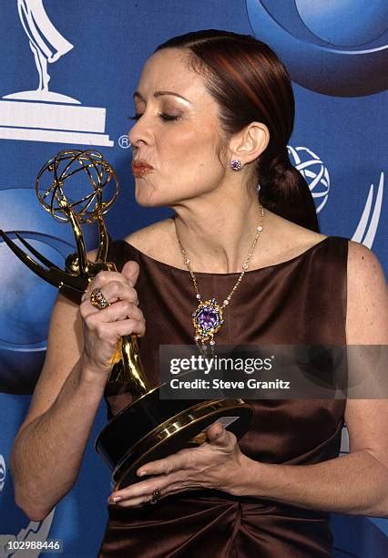 Patricia Heaton Shows Her Emmy Award After She Won Best Actress In A