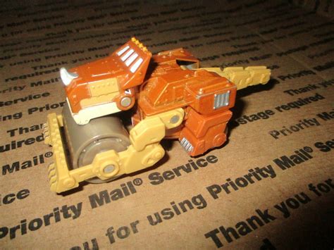 Dinotrux Rollodon Diecast Vehicle Brown Roller Dinosaur Metal Figure
