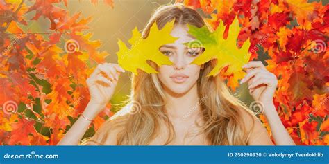 Banner Of Sensual Woman Holding Autumn Leafs In The Nature Beautiful