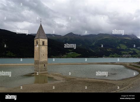 Church Under Water Drowned Village Mountain Landscape And Peaks In