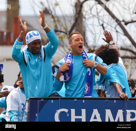 Chelsea Football Club Players And Staff Take A Victory Parade On An Open Top Bus After Winning