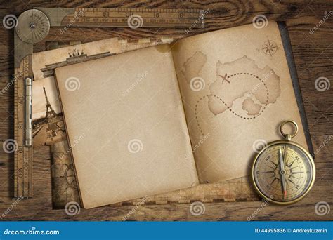 Vintage Treasure Map In Open Book With Compass And Old Ruler Stock