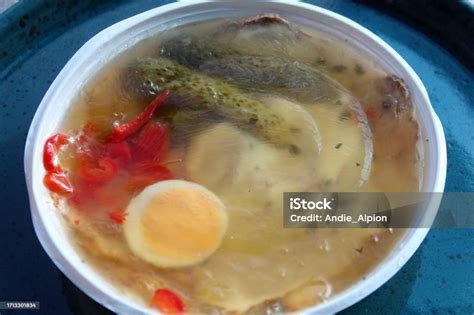 Plate Of Aspic With Beef Egg Pickle And Paprika There Is A Jelly On Top