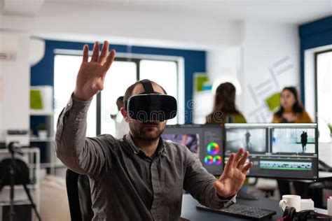 Video Editor Experiencing Virtual Reality Headset Gesturing Editing Film Montage Stock Image