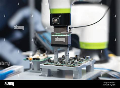 Microchip And Microprocessor Assembly With Automated Robotic Arm Factory Equipment Electronics