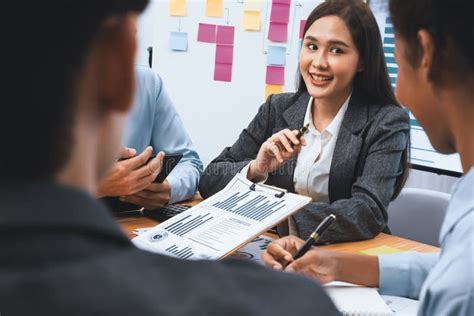 Multiracial Analyst Team Use Bi Dashboard For Data Analysis With Laptop