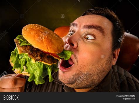 Fat Guy Eating Burger Hungry Fat Man Eating Burger Side View