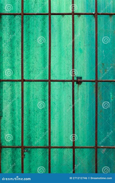 Iron Arranged In The Form Of A Rectangular Column With A Green