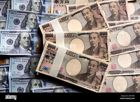 Pattern Of Us Dollars And Japanese Yen In Large 100 And 10 000 Yen