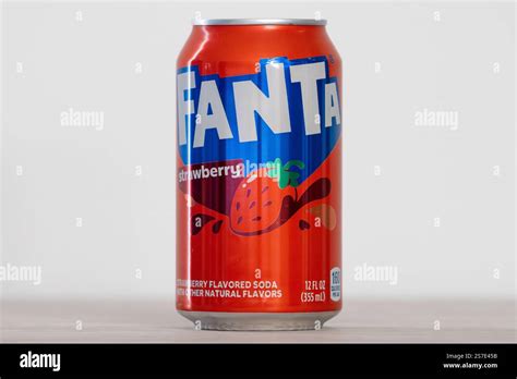 Fanta Strawberry Flavored Soda Against A White Background Red Beverage