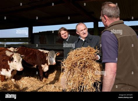 Liberal Democrats Leader Sir Ed Davey With Farmer Chris Blaxell Right