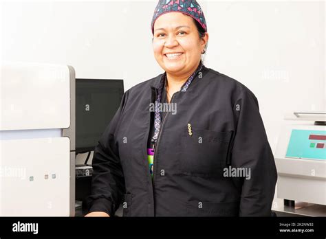 Female Scientist Working At The Laboratory With A Thermal Cycler Polymerase Chain Reaction