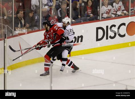 Los Angeles Kings Center Jarret Stoll 28 Checks New Jersey Devils