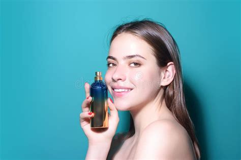 Woman With Perfume Bottle In Studio Girl With Perfume Young Beautiful
