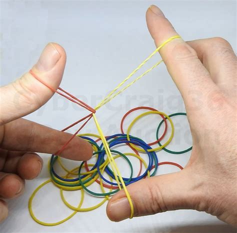 Cool Rubber Band Tricks A Simple Rubberband Through Finger Trick