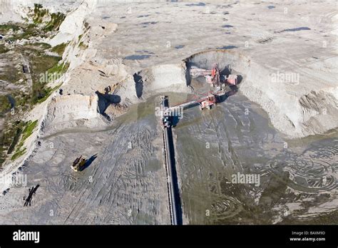 Aerial View Of Open Cast Mine And Earthmover At A Marl Pit Misburg