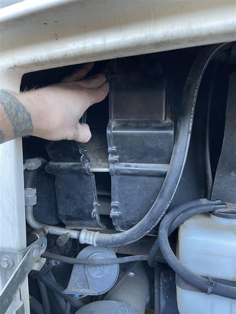 Engine Intake Filter Replacement I Took Out All The Screws And It Wont Budge How Do I Get It