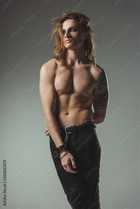 Shirtless Long Air Boy Stylish And Confident Fashion Statement