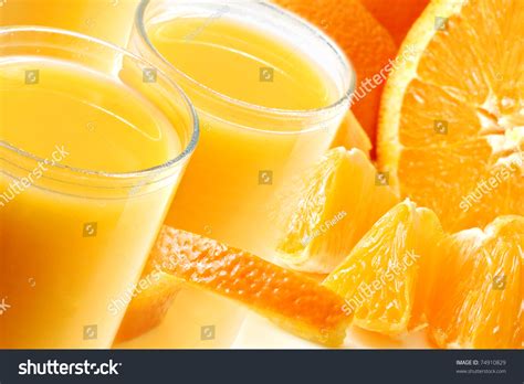 Freshly Squeezed Orange Juice Montage. Stock Photo 74910829 : Shutterstock