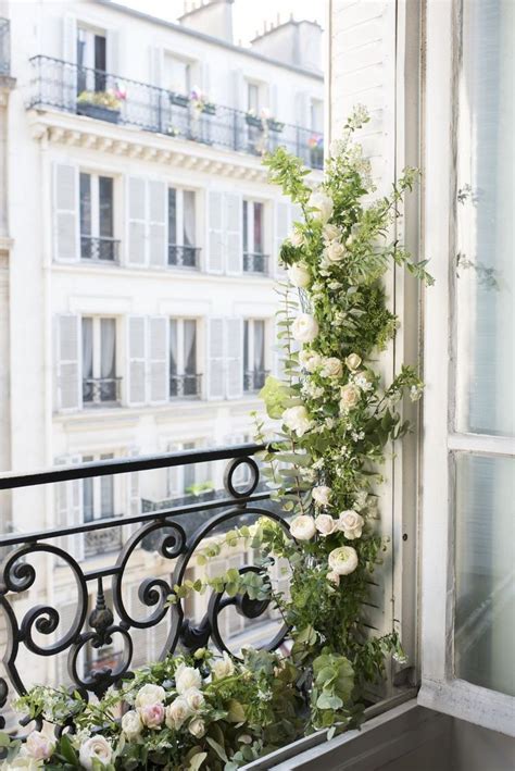 Classic Parisian Balcony Design With Iron Decor And Floral Garland French Balcony Flowers