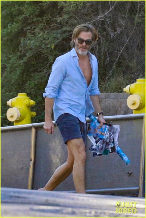 Chris Pine Goes Barefoot While Grabbing Books From Public Bookshelf