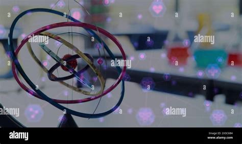 Image Of Network Of Connection With Interface Icons Over Model Of Atom Moving In Laboratory