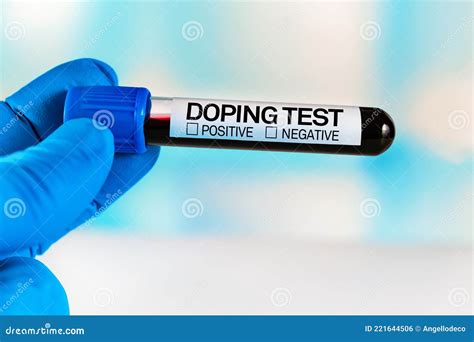 Lab Technician Holding A Blood Sample Tube For Analysis Doping