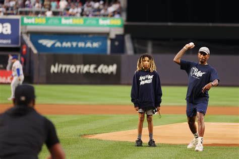 Pharrell And Son Throw First Pitch At New York Yankees Game Popsugar Celebrity