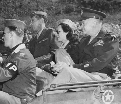 Kay Summersby Seated Between Generals Eisenhower And Mark Clark In A