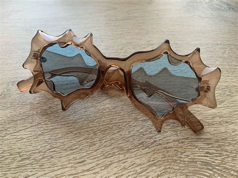 Spiked Seashell Sunglasses Sourceat
