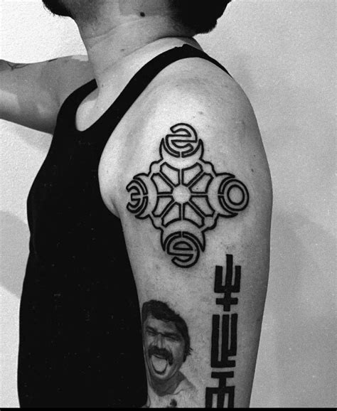 Him Logo Tattoo Inked With Knowledge Cochrane Logo Tattoo Reflects