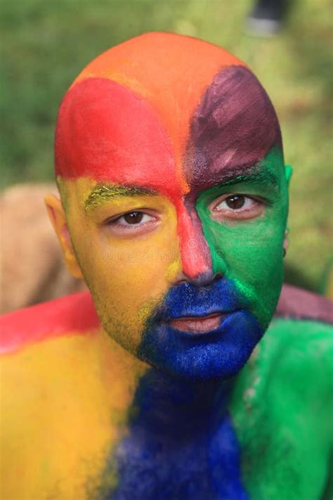Preparation And Body Painting For The Nude Bicycle Editorial Photo