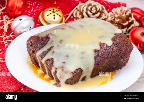 Traditional South African Malva Pudding With Creamy Custard On Rustic Christmas Table A