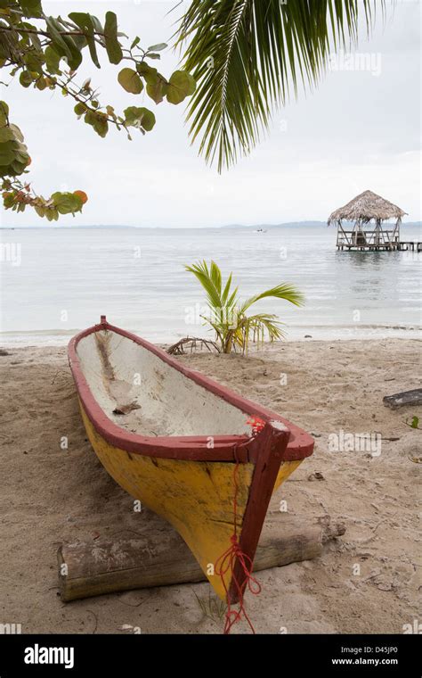 Traditional Dugout Canoe Cayuco On The Shore At Carenero Island