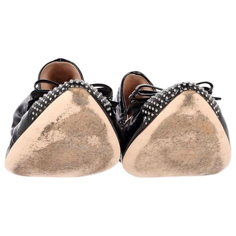 Miu Miu Embellished Bow Scrunch Ballet Flats In Black Patent Leather
