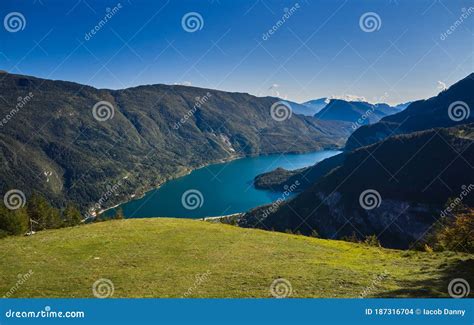 Aerial View Over The Beautiful Molveno Town And Molveno Lake An Alpine